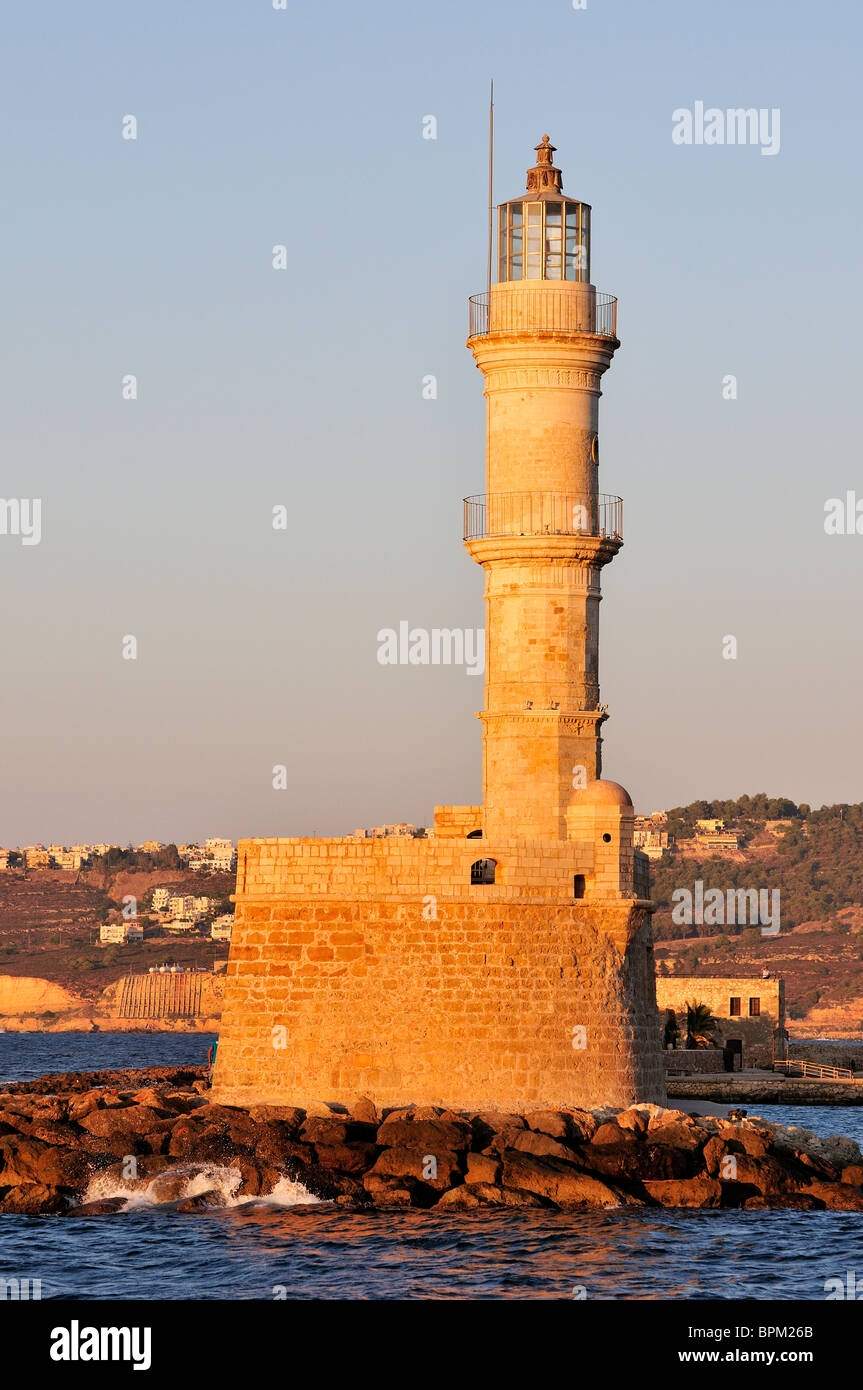 The lighthouse at the old port of Chania during sunset, Crete island ...