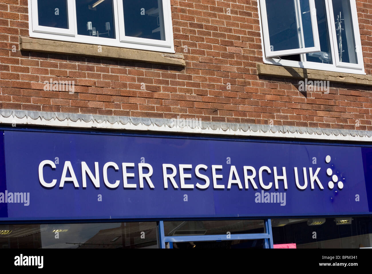 Cancer Research UK sign Stock Photo - Alamy