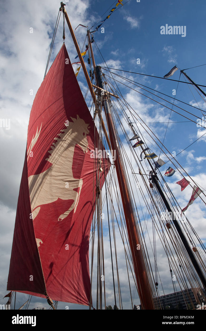 The red sail of a ship. Amsterdam Sail 2010 Stock Photo - Alamy