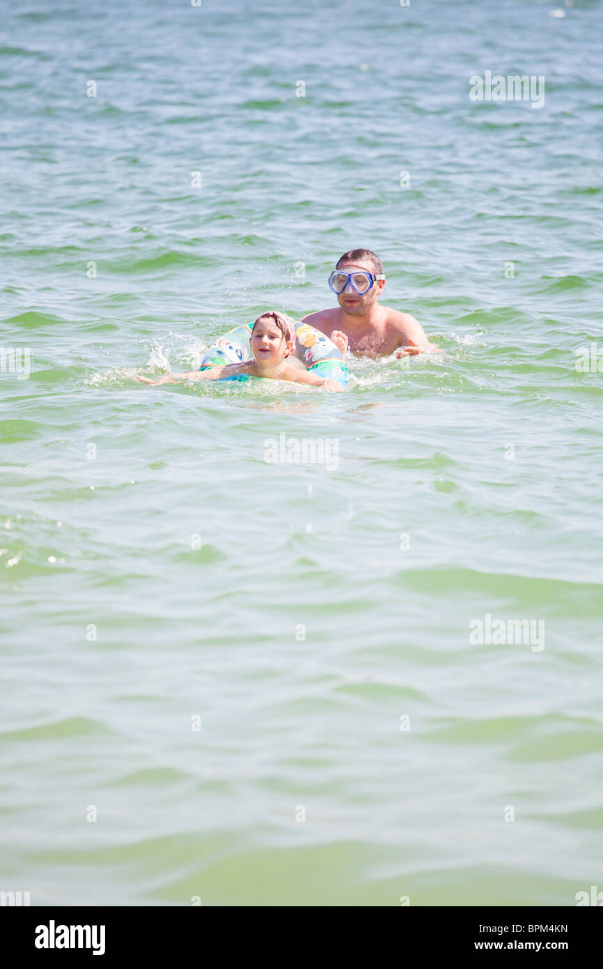 Father and daughter having fun at the seaside in Romania Stock Photo ...