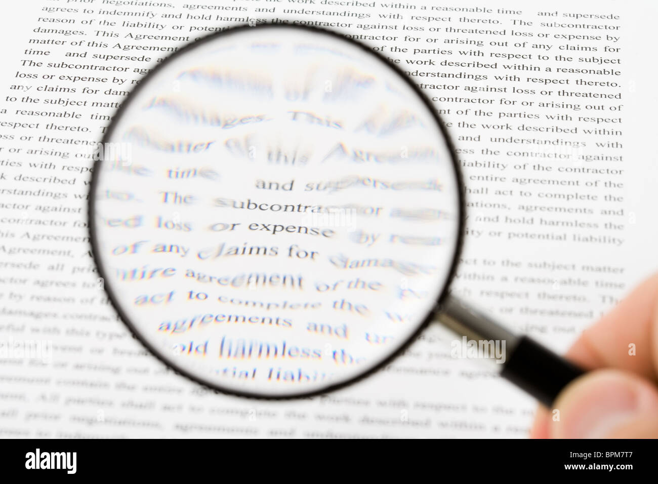 Magnifying Glass and document close up Stock Photo - Alamy