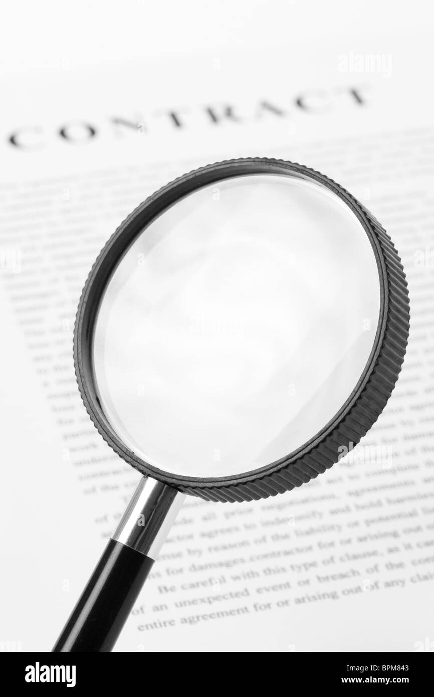 Magnifying Glass and document close up Stock Photo - Alamy