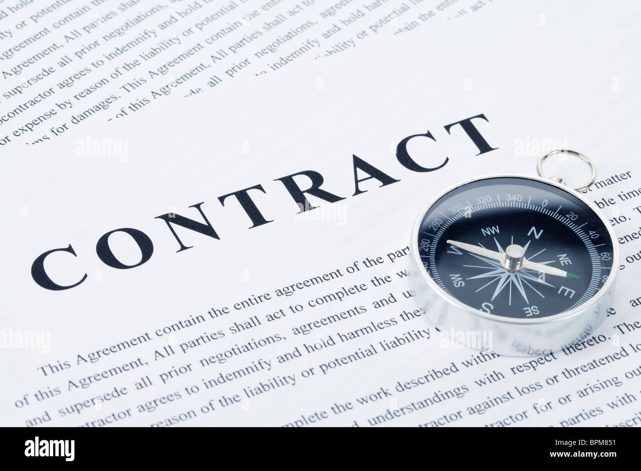 Business Contract and Compass, business concept Stock Photo - Alamy