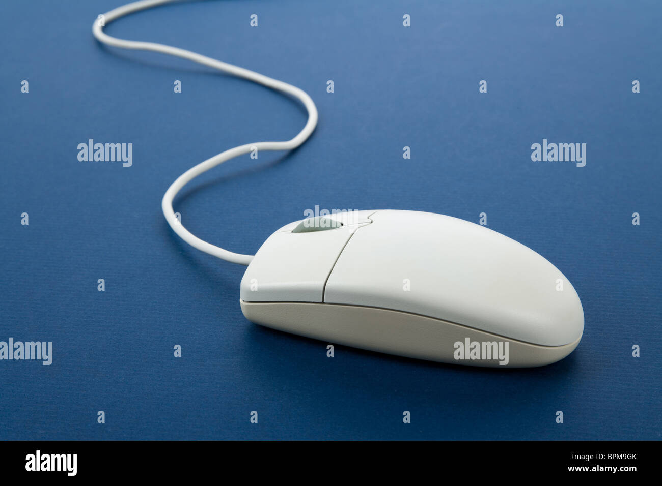 computer mouse with blue background Stock Photo - Alamy