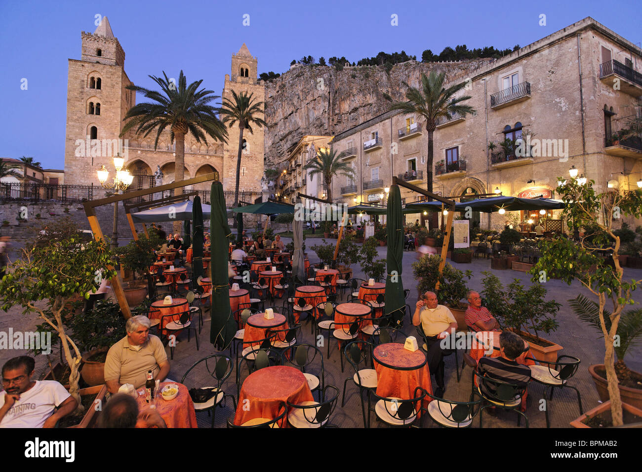 Open-air restaurant near Cathedral-Basilica of Cefalu, Sicily, Italy ...