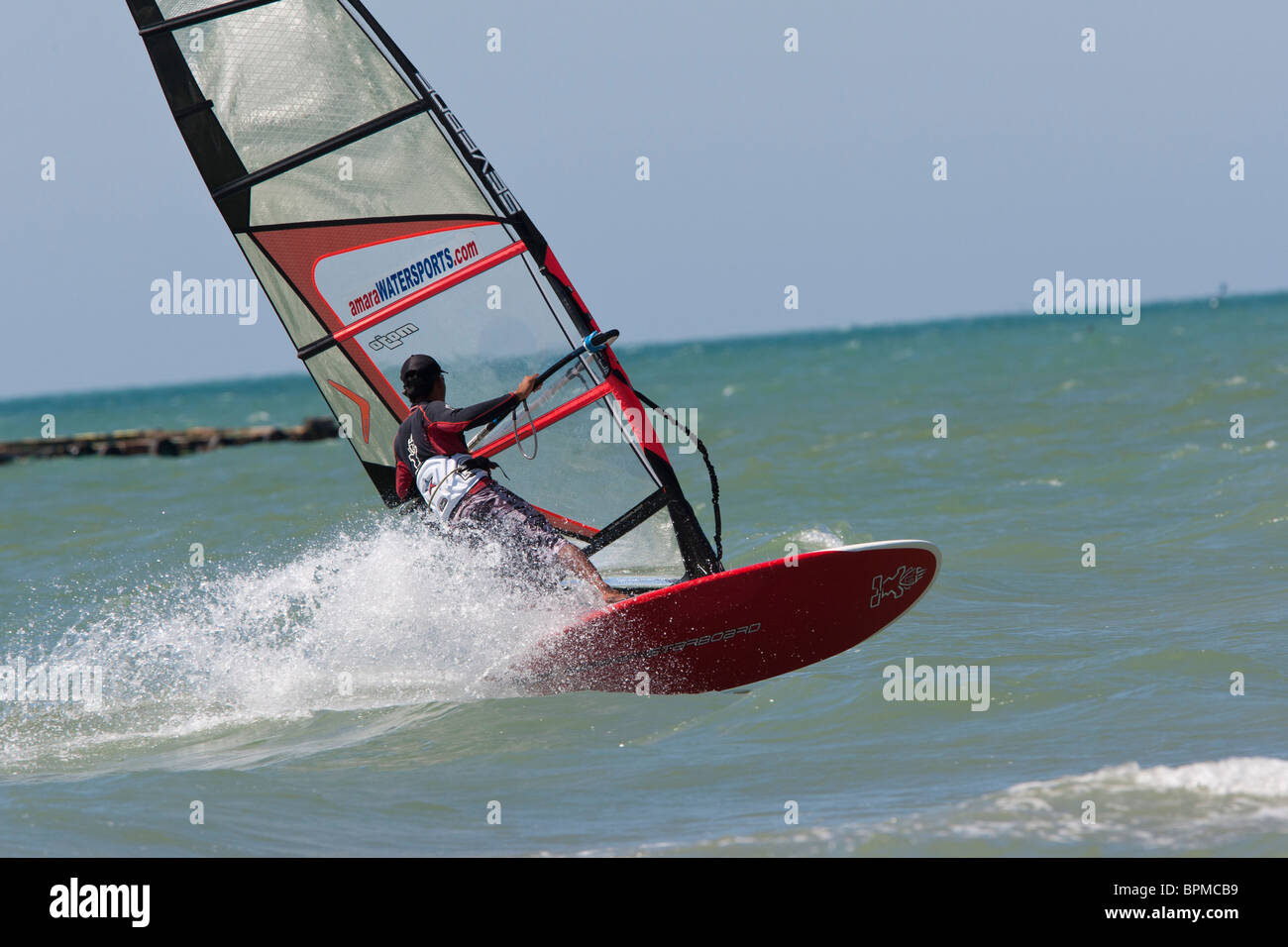 A windsurfer executes a tight turn Stock Photo - Alamy
