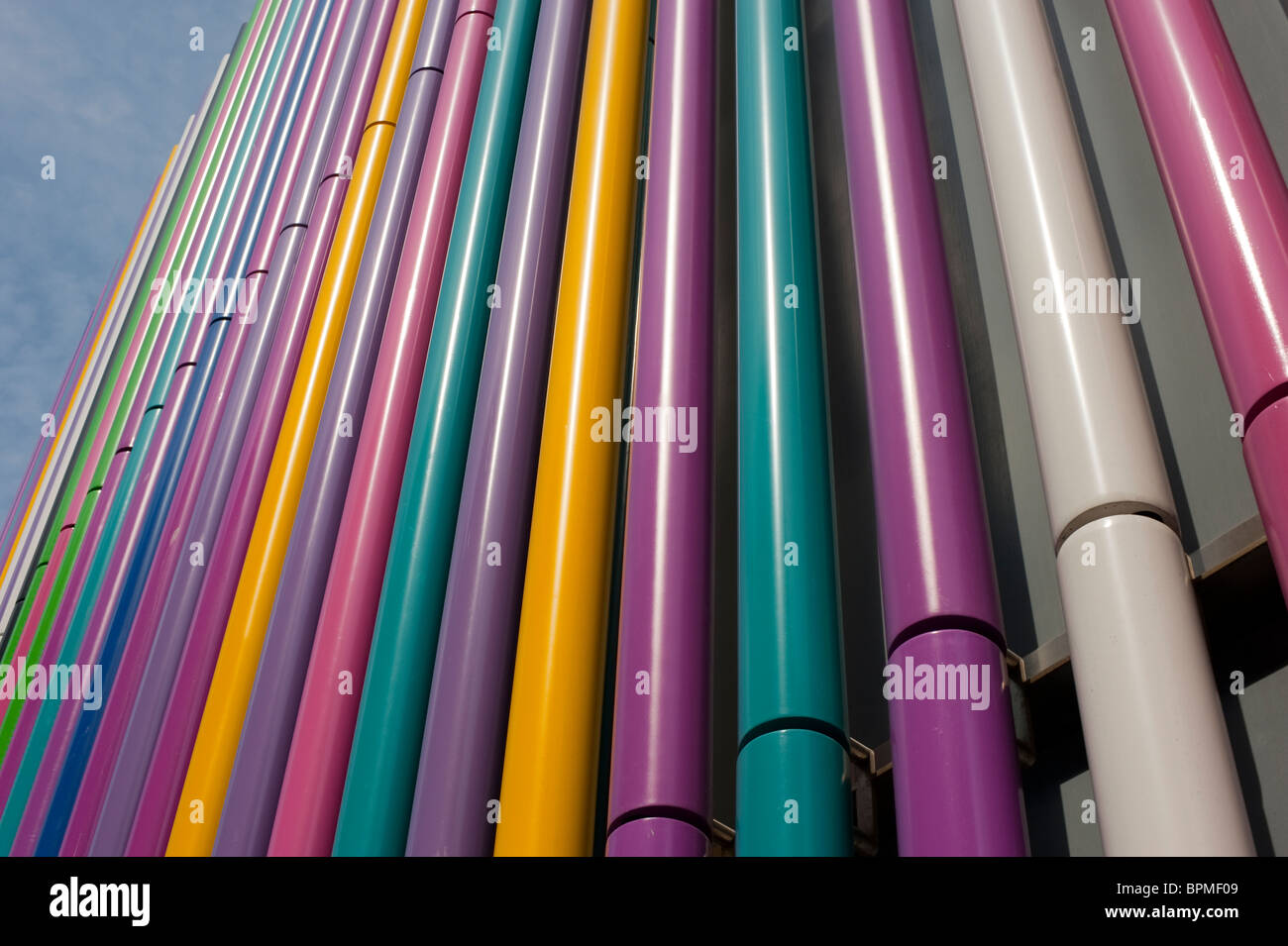 Bright multi coloured columns on modern building Stock Photo - Alamy