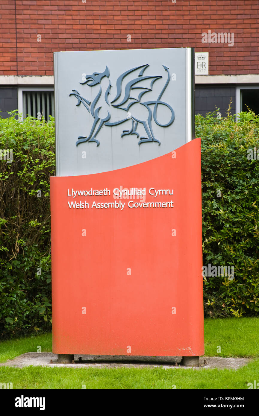 Bilingual Welsh English language sign with dragon outside Welsh ...