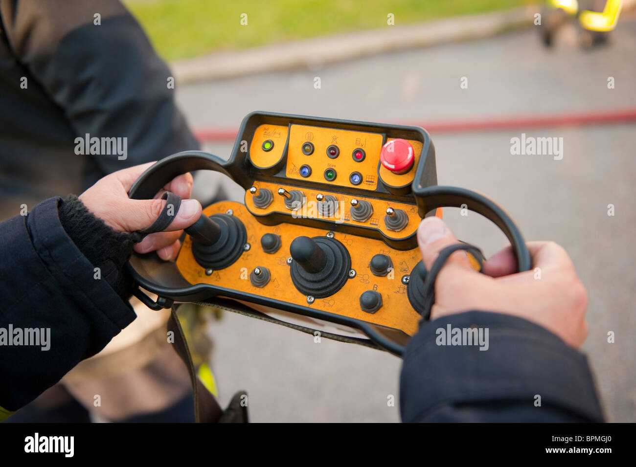 Remote control for fire brigade hydraulic platform Stock Photo - Alamy