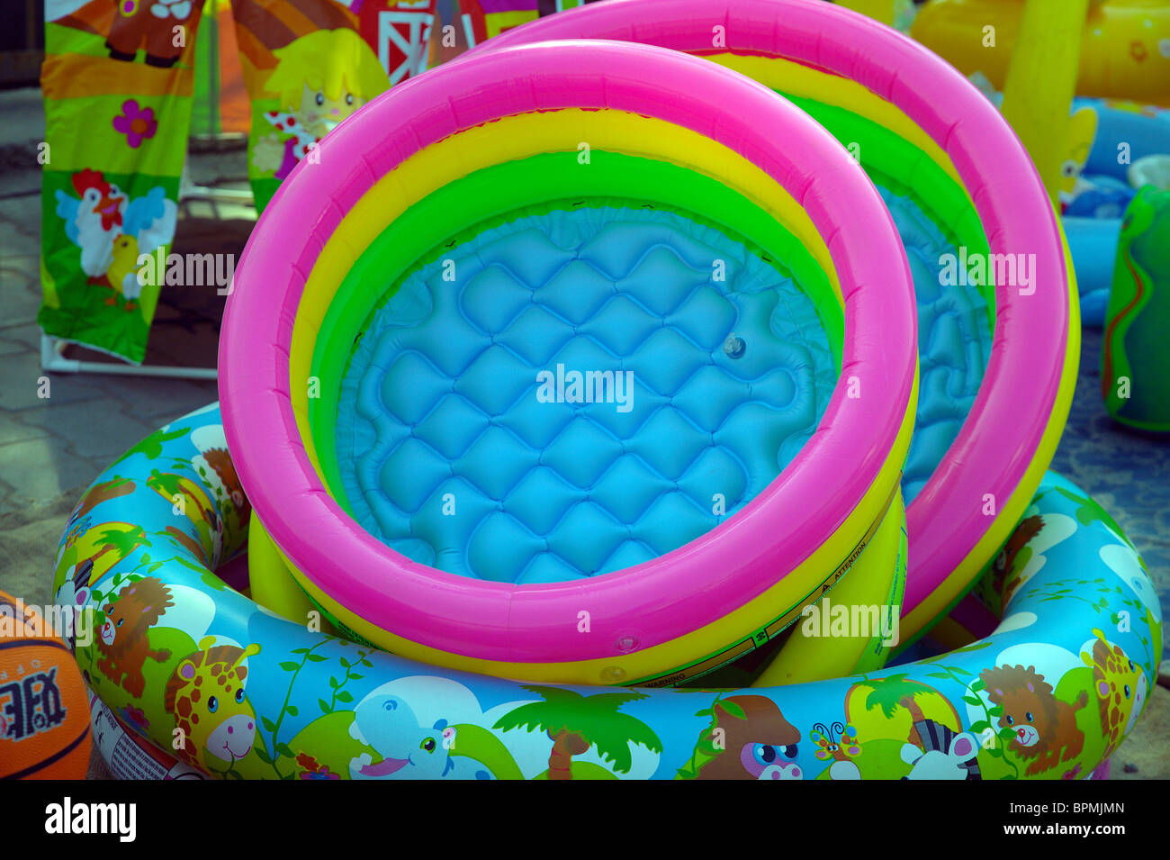 Colorful balloons and plastic ware on sale Stock Photo - Alamy