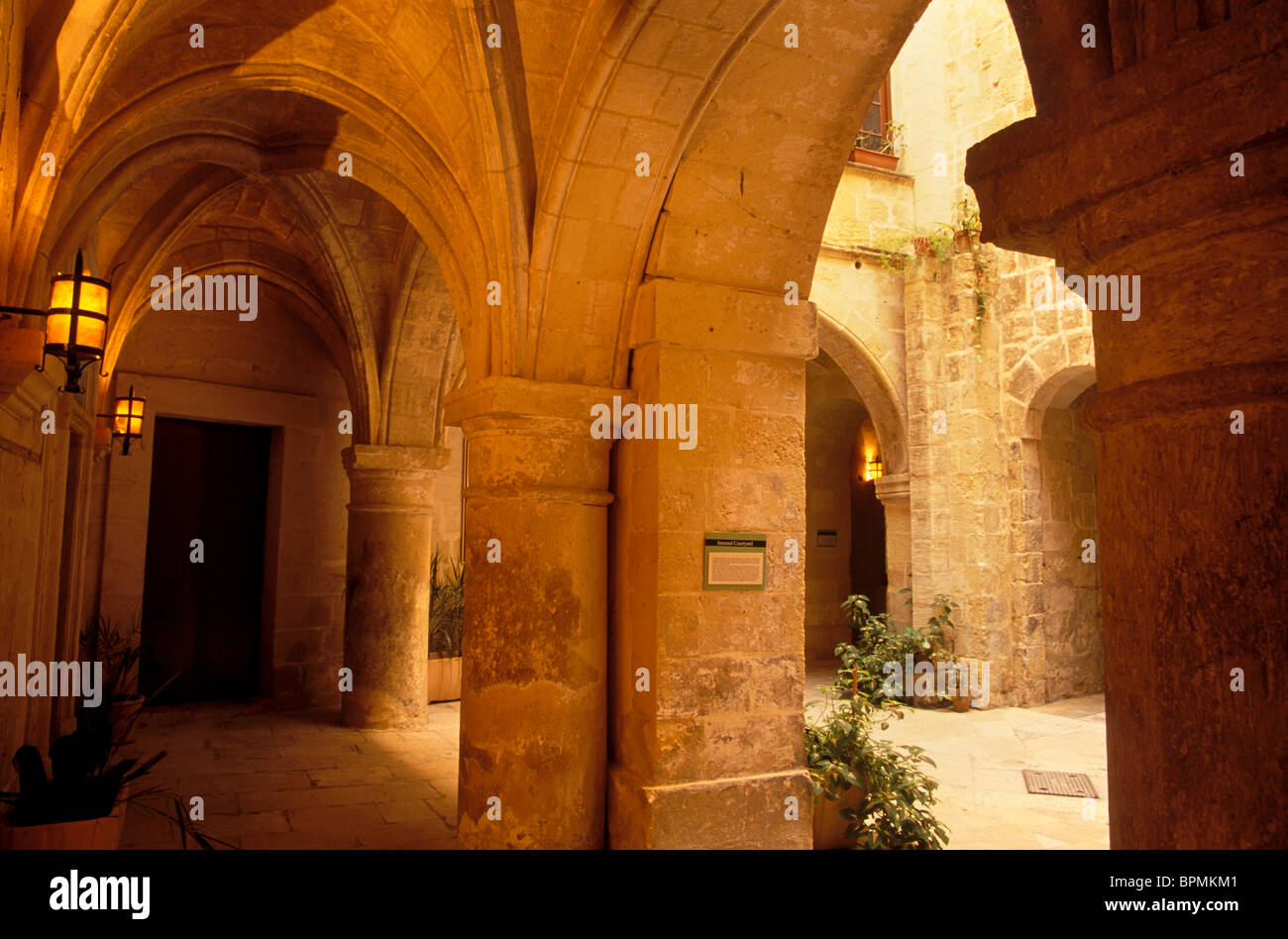 Malta, the beautiful neo-gothic courtyard with cross-ribbed ceiling at ...
