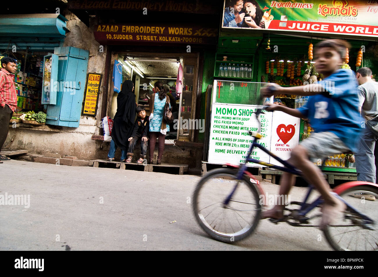 Daily scenes in the narrow streets around Sudder street in old Kolkata ...