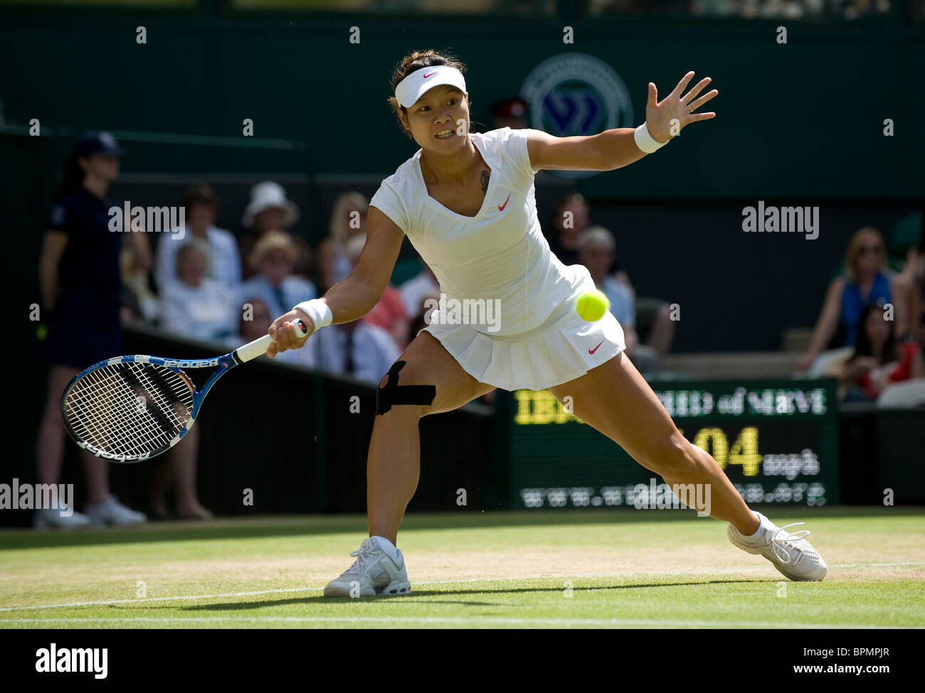 Na Li (CHN) in action during the Wimbledon Tennis Championships 2010 ...