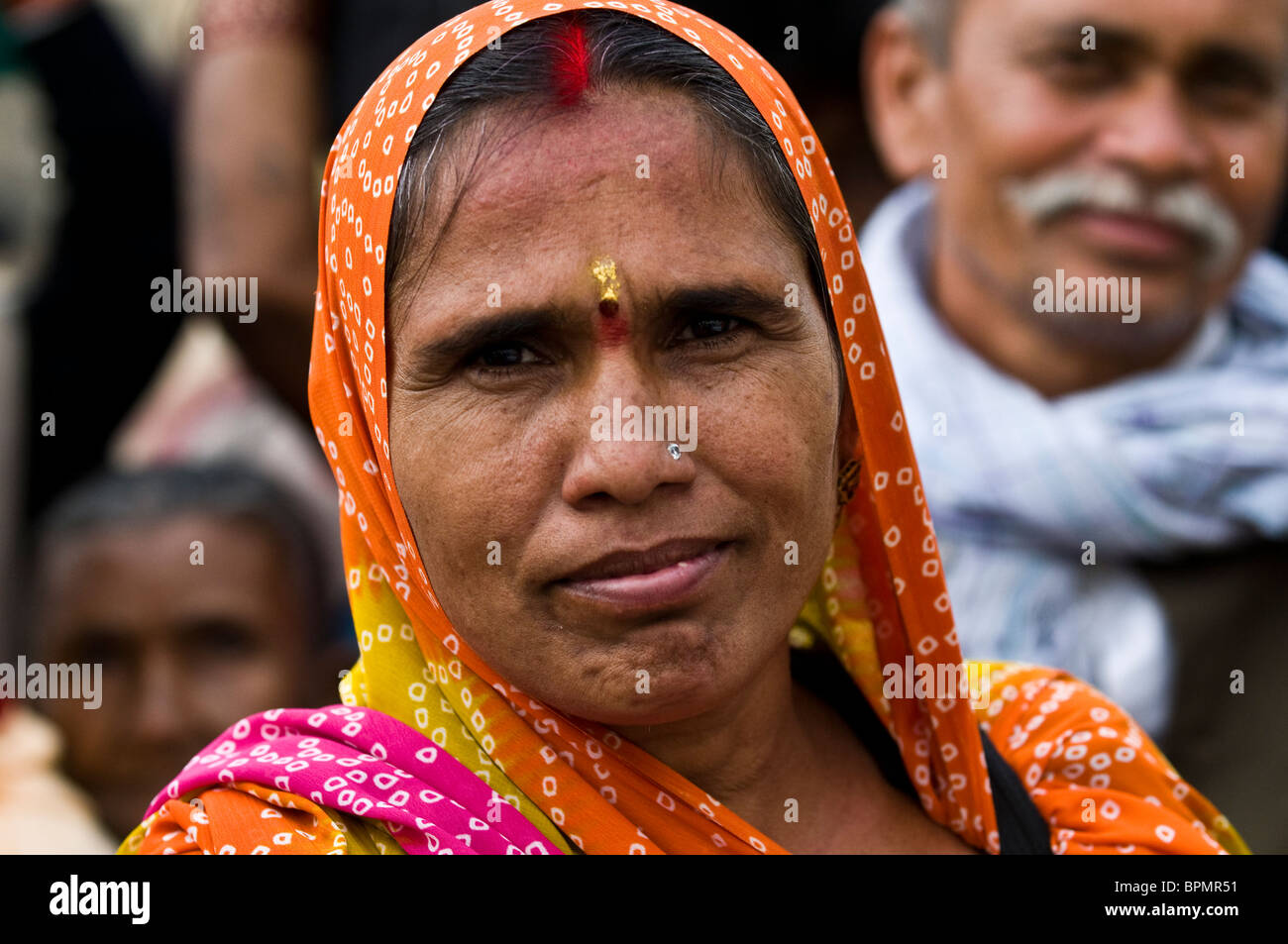 Hindu women praying and bathing in the holy Ganges water Stock Photo ...
