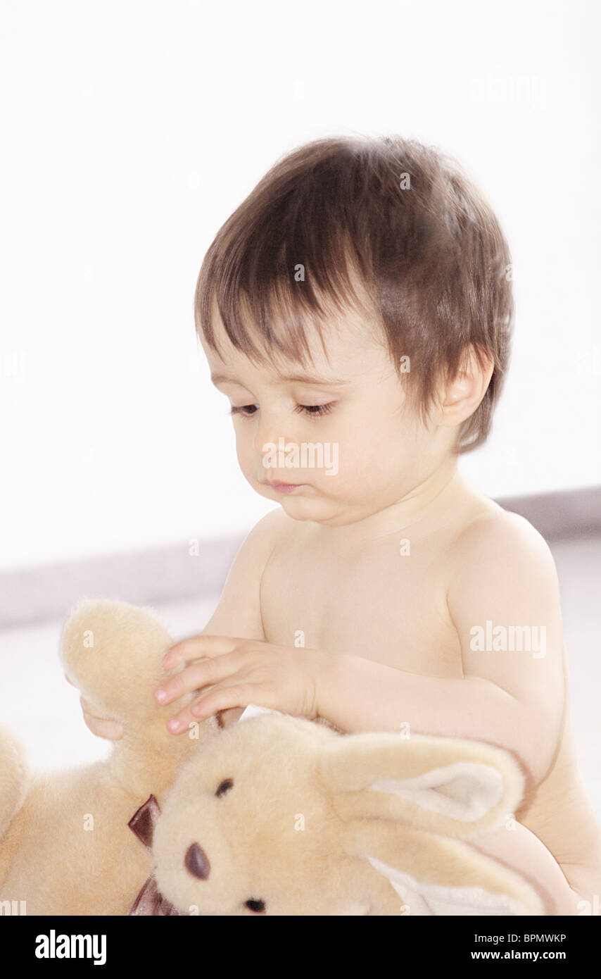 Little boy with rabbit Stock Photo - Alamy