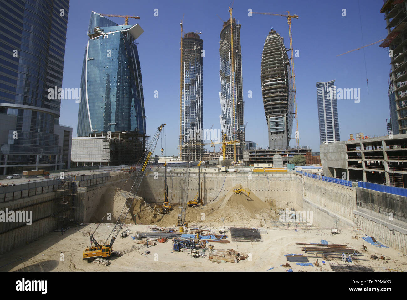 High rise buildings and construction site in Dubai, UAE, United Arab ...