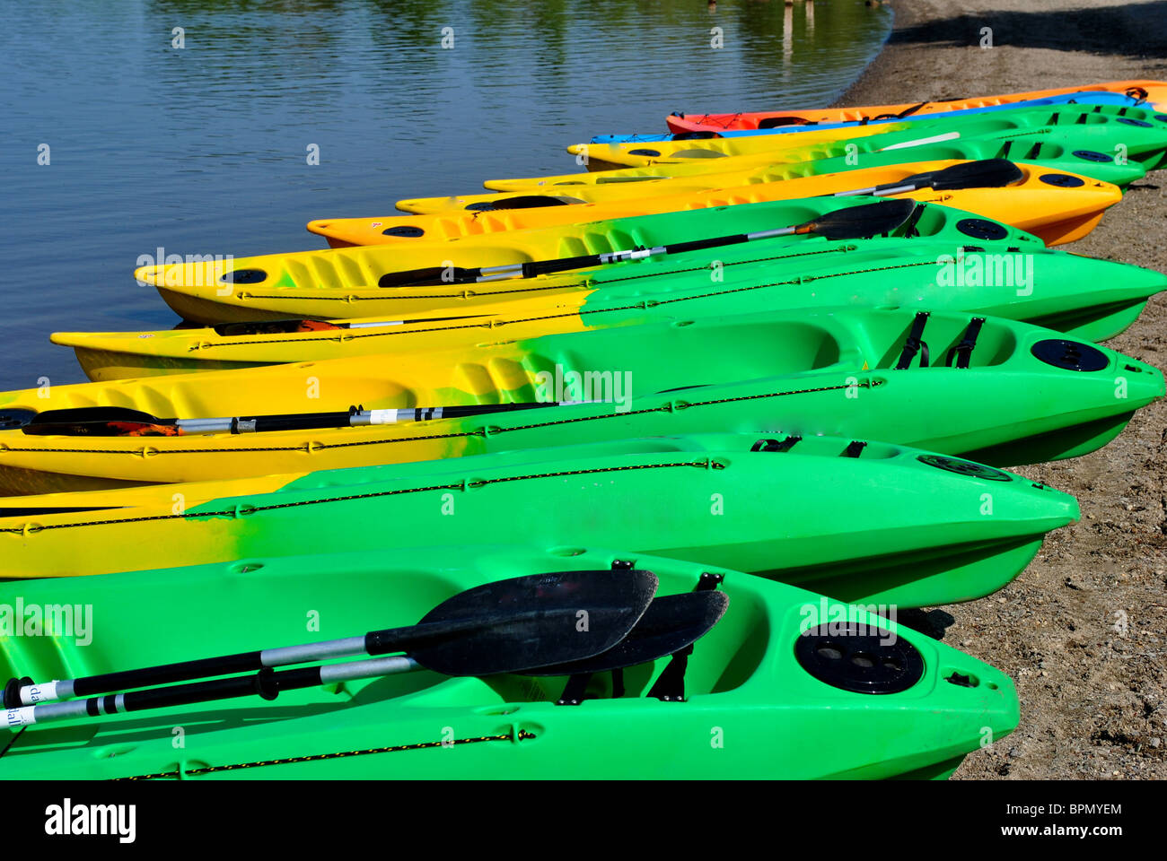 Green kayaks hi-res stock photography and images - Alamy