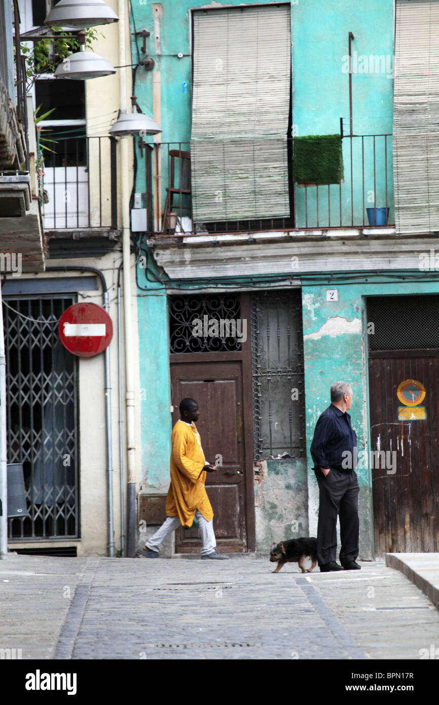 A block of poor houses and flats street scene from Olot in the La ...