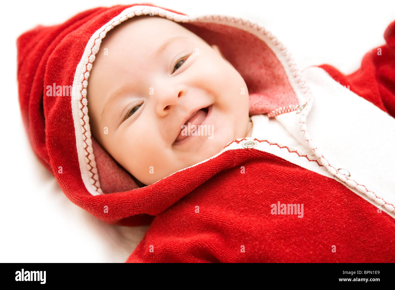 Baby girl dressed in a funny red costume isolated on white Stock Photo ...