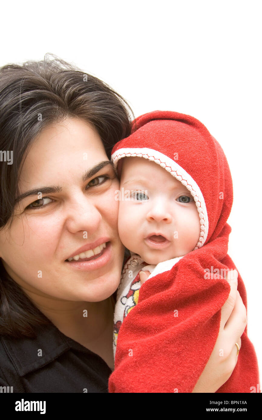 Adorable baby girl dressed in red costume playing with mommy Stock ...
