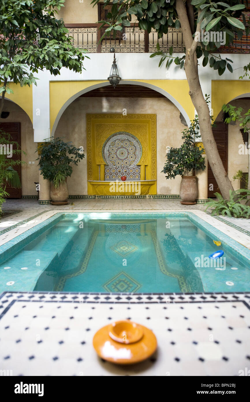 Patio with a pool of a Riad in Marrakech, Morocco Stock Photo - Alamy