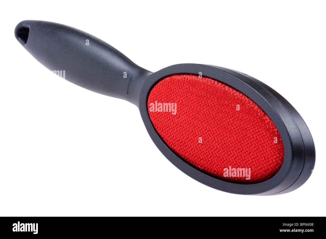 object on white - tool brush for clothes Stock Photo - Alamy