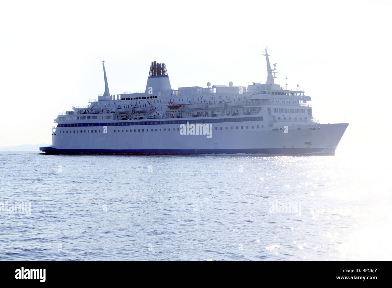cruise boat offshore ocean reflection backlight mediterranean sea Stock ...