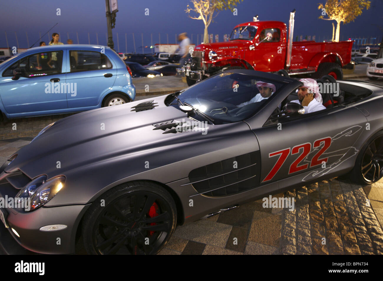 Luxury cars at Jumeirah Beach Residence in the evening, Dubai, UAE ...