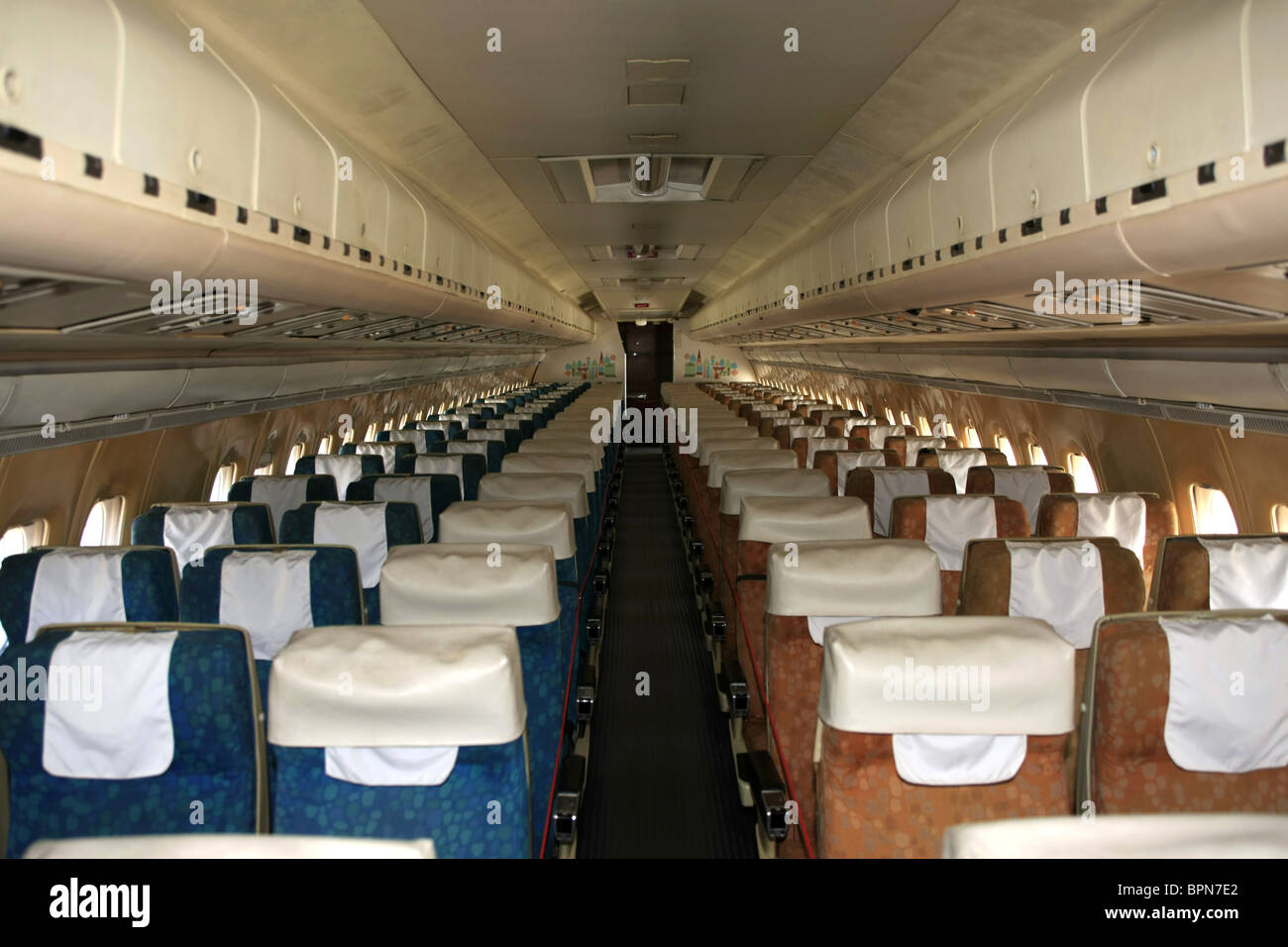 Cramped airplane seating hi-res stock photography and images - Alamy