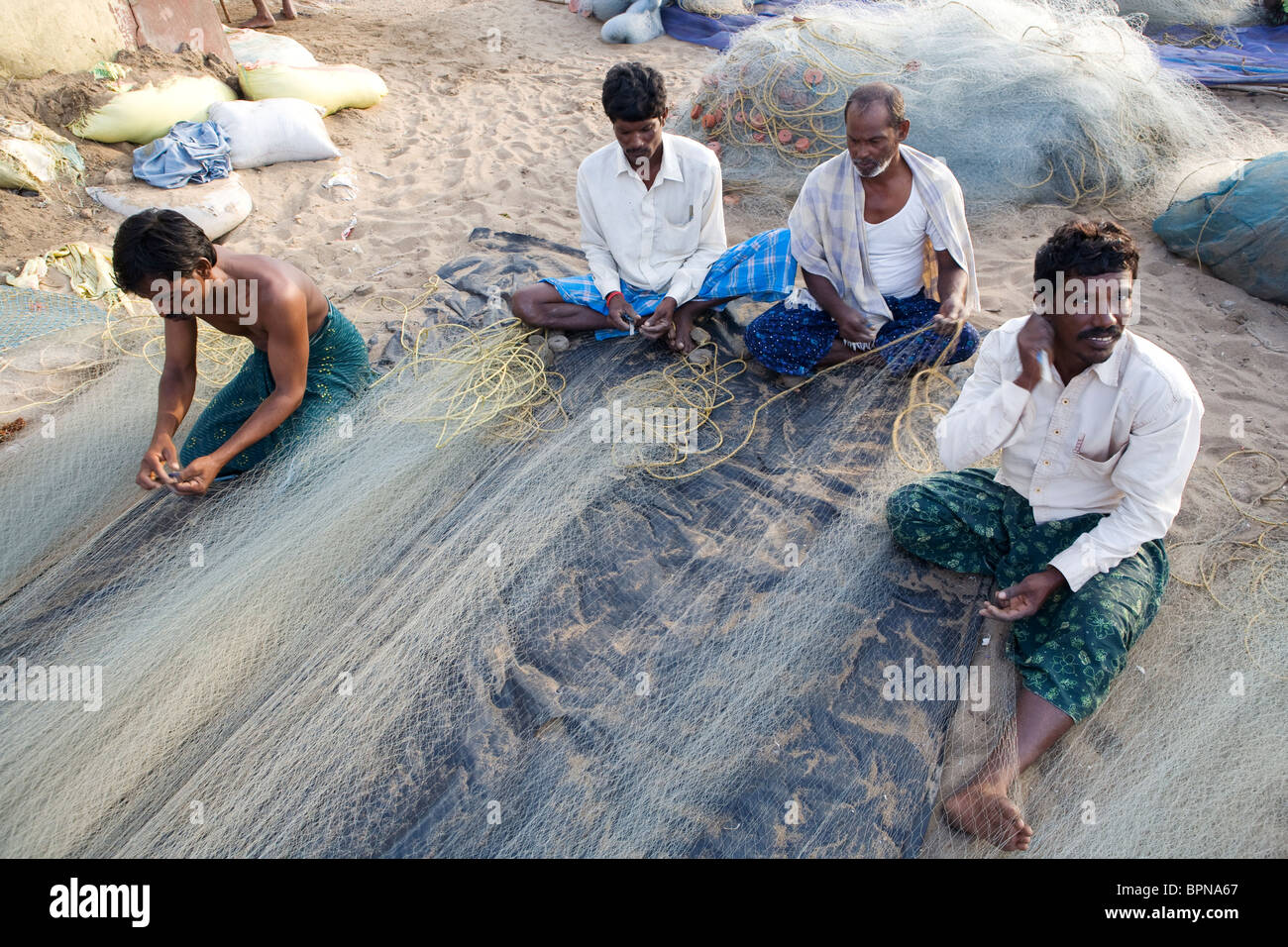 Preparing fishing nets hi-res stock photography and images - Alamy