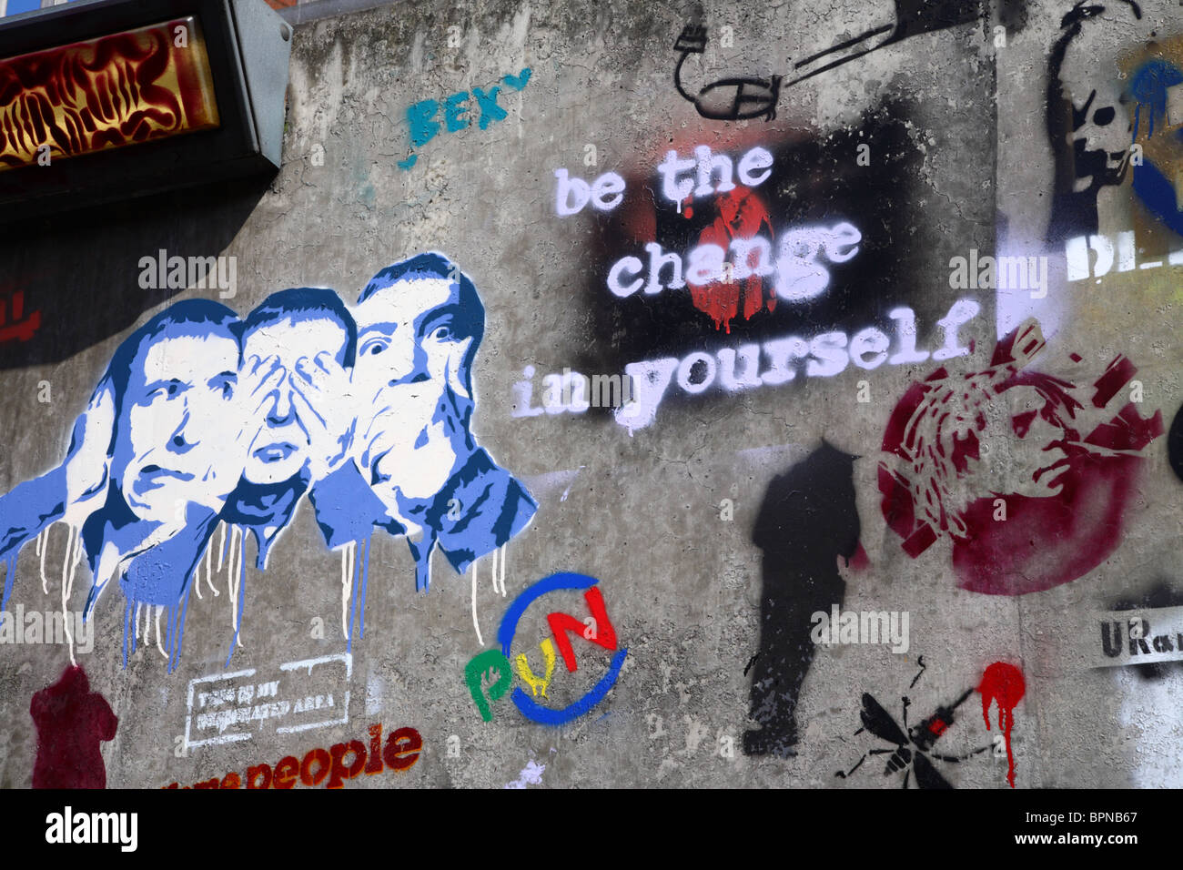 Graffiti showing a "Be the change in yourself" slogan in Leake Street ...