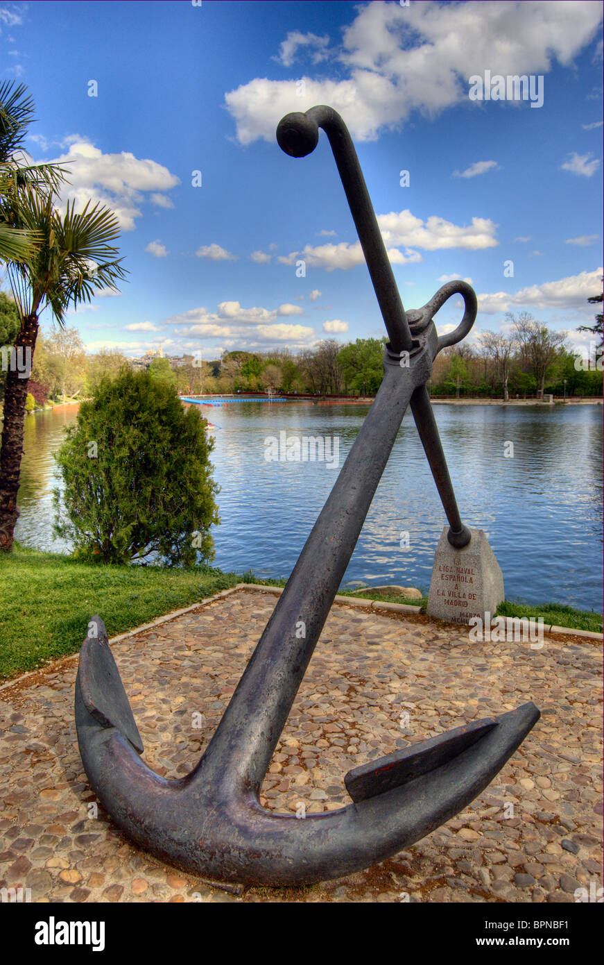 Anchor anchored in earth Stock Photo - Alamy