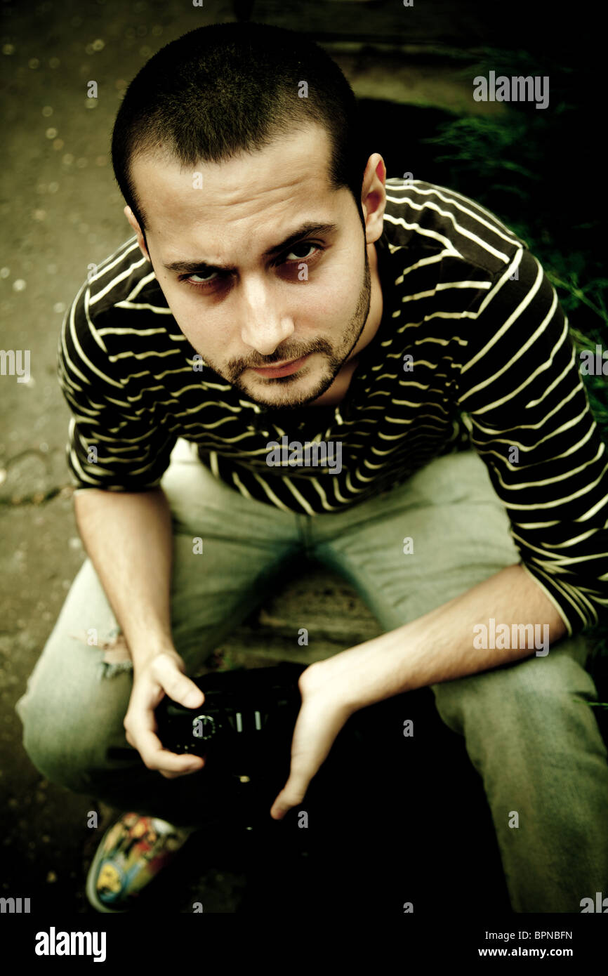Vinatage portrait of a young photographer looking up Stock Photo - Alamy