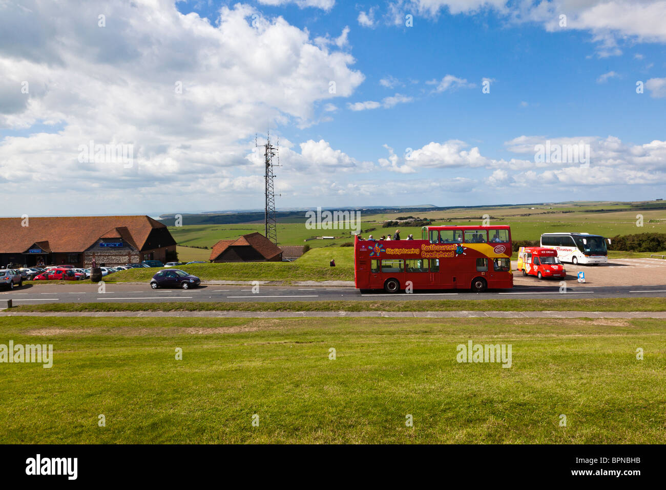 An open top sightseeing bus stops at Beachy Head visitors centre, East ...