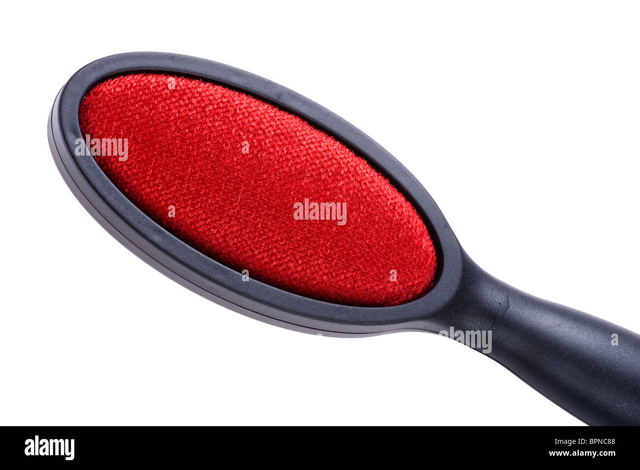object on white - tool brush for clothes Stock Photo - Alamy