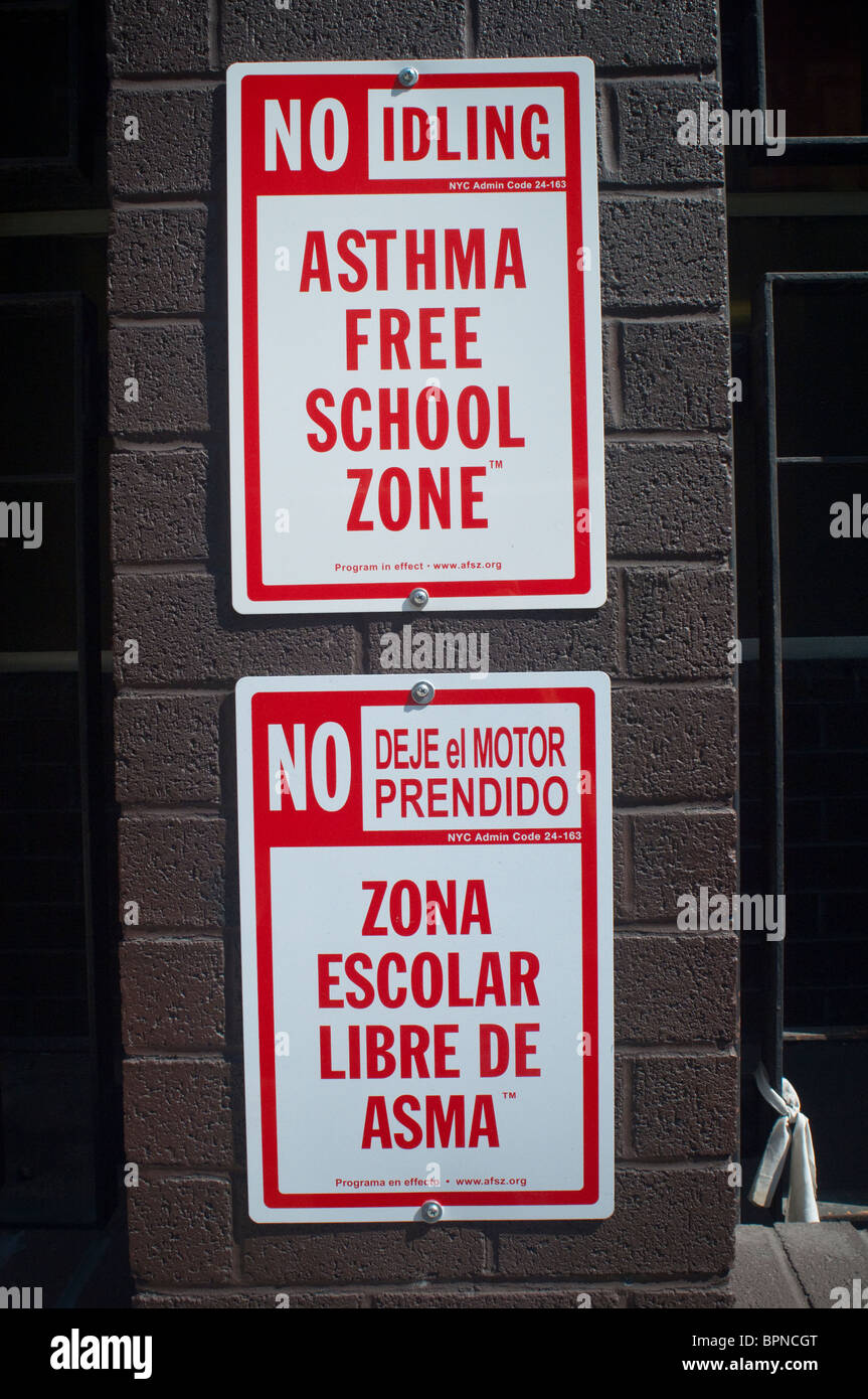 English and Spanish signs outside of a school in New York Stock Photo ...