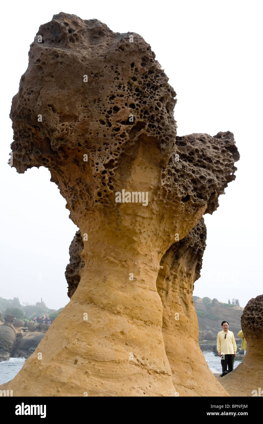 Chinese tourists at the Queen's Head formation at Yeh Liu GeoPark ...