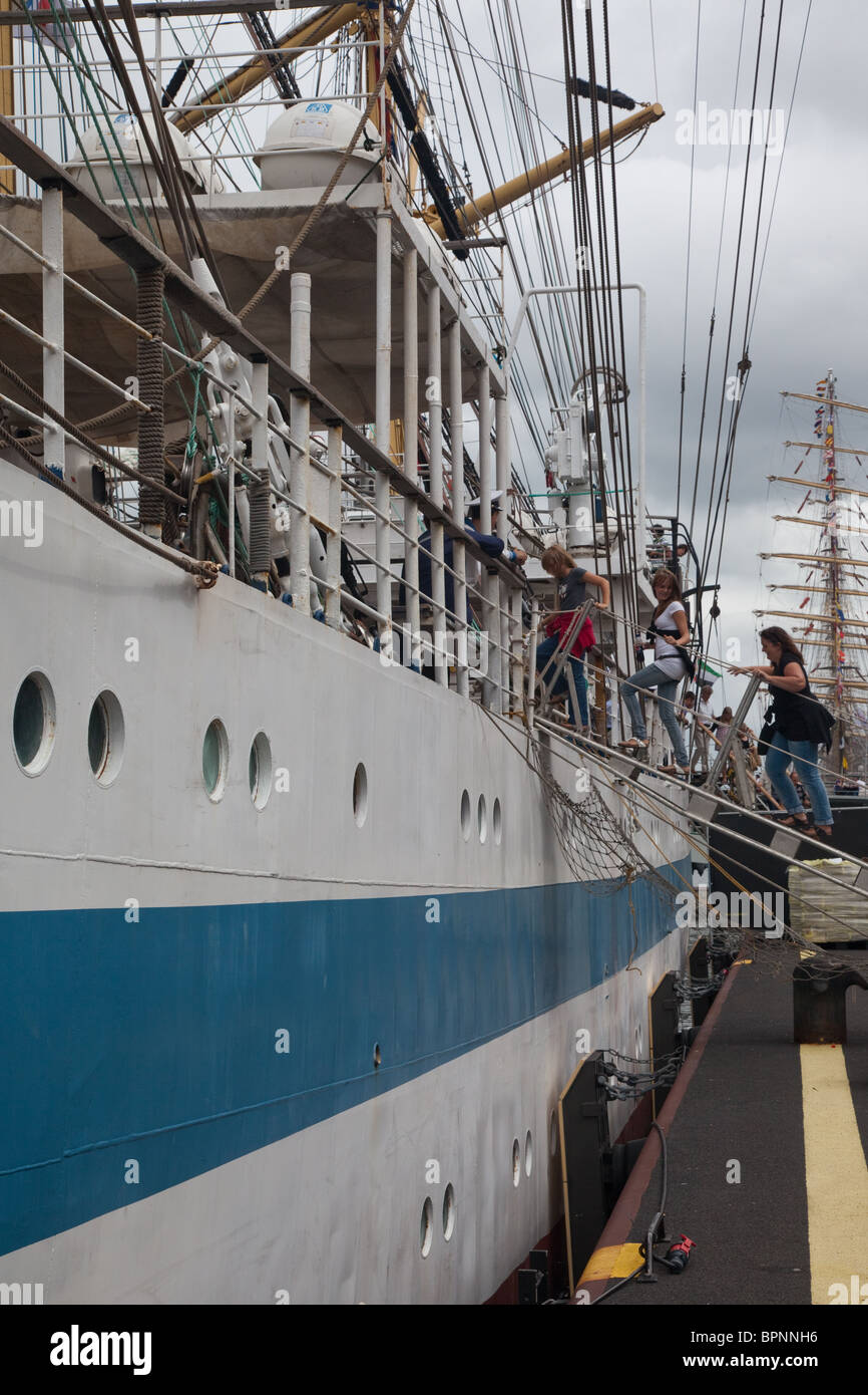 The side a blue and white tall ship Stock Photo - Alamy