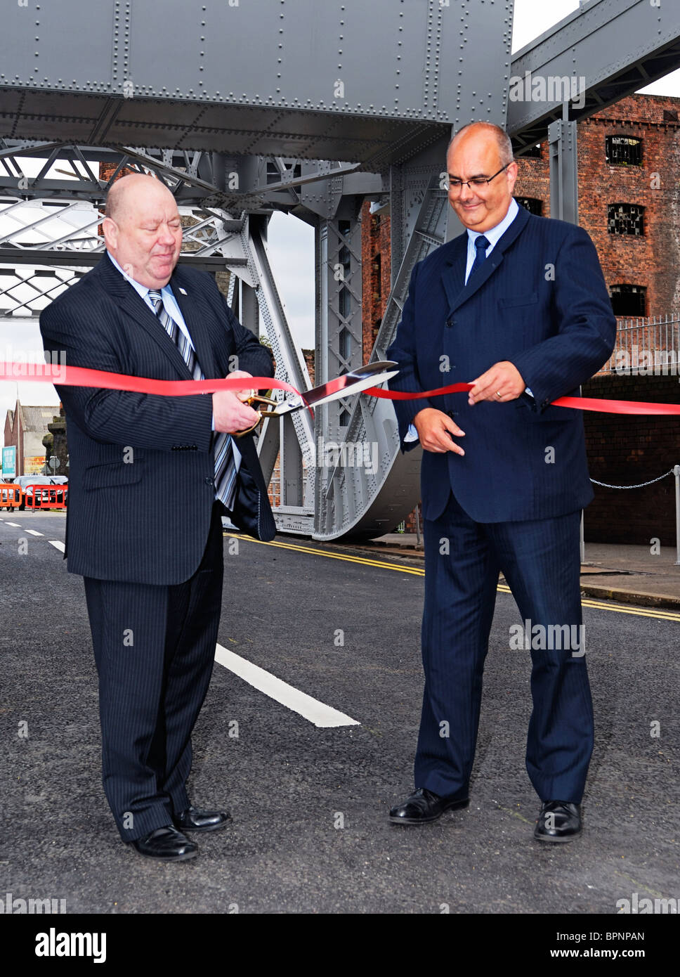 Local councillor Joe Anderson and Ian Porritt cutting the ribbon at the ...