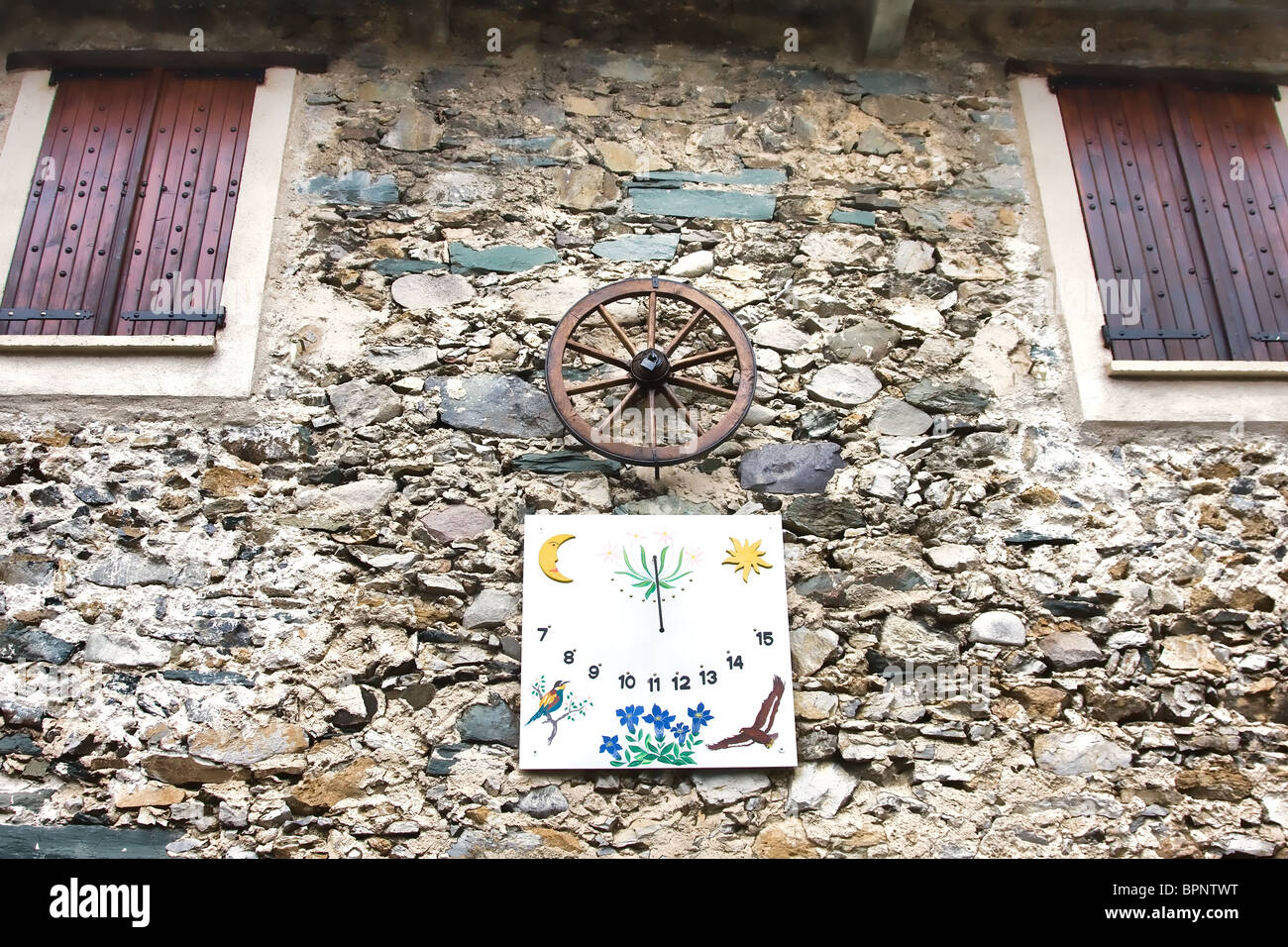Rustic solar clock in Tende, France Stock Photo - Alamy