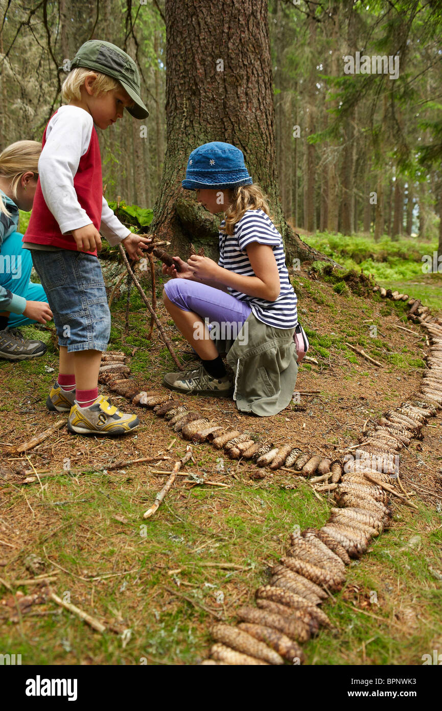 Wooden house for dwarf in forest - build by children Stock Photo - Alamy