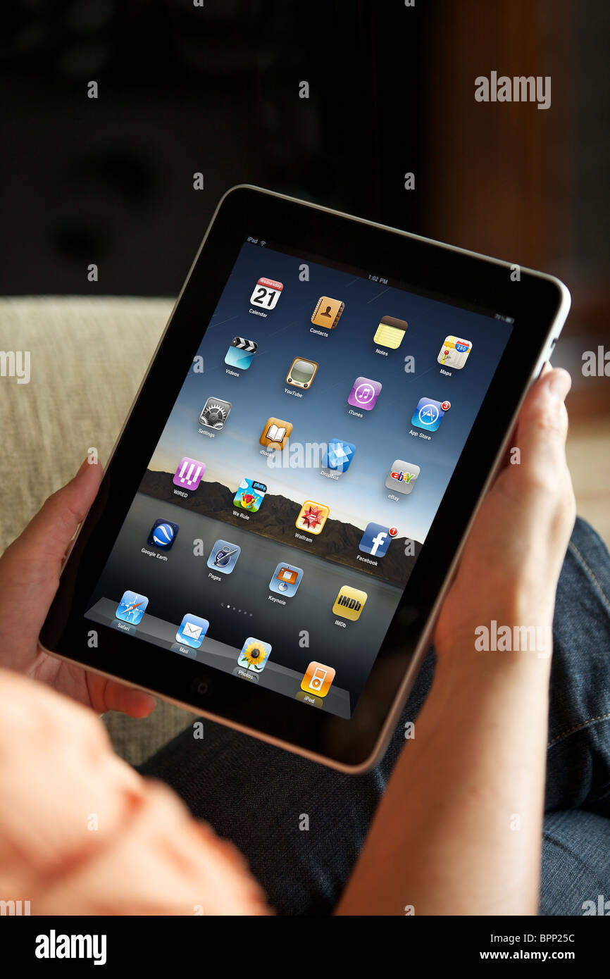 Close up of a woman hand holding an iPad Stock Photo - Alamy