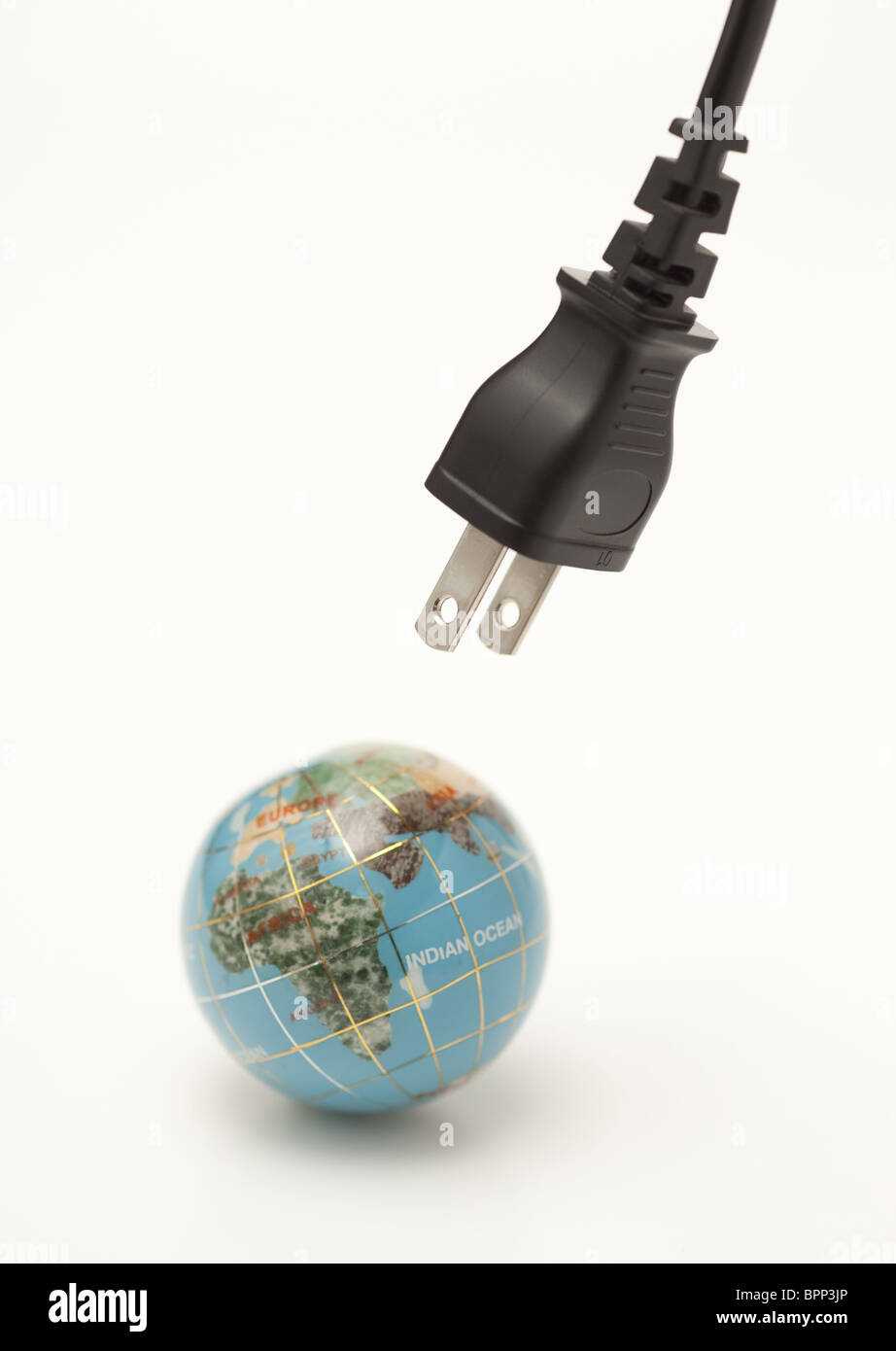 Globe and plug Stock Photo - Alamy