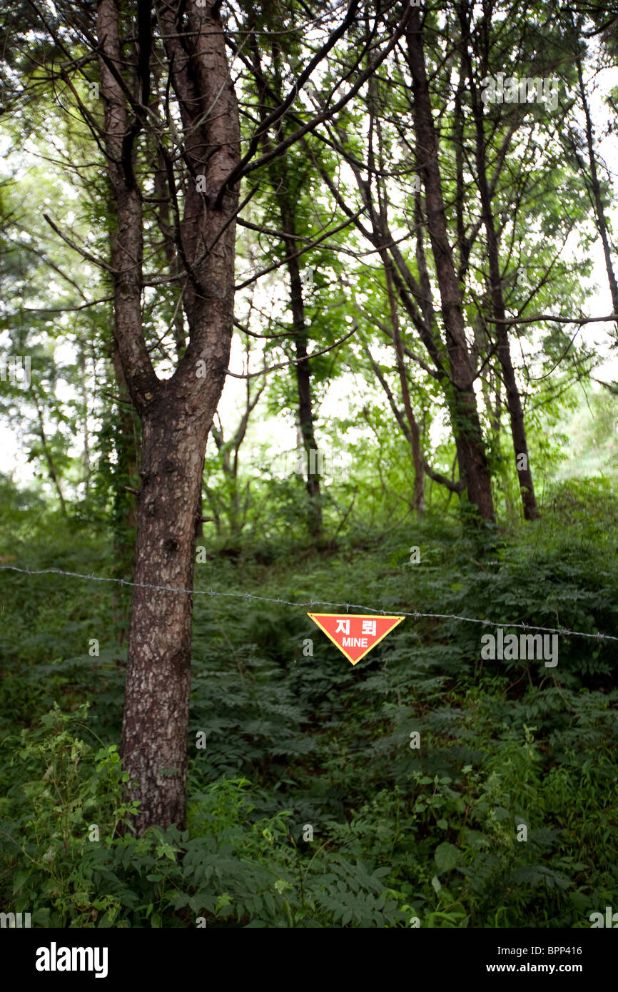Sign warning of the presence land mines, on the southern side of the ...
