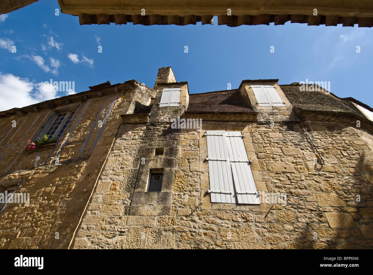 Medieval building, Roof, eaves and shuttered windows, Sarlat-la-caneda ...