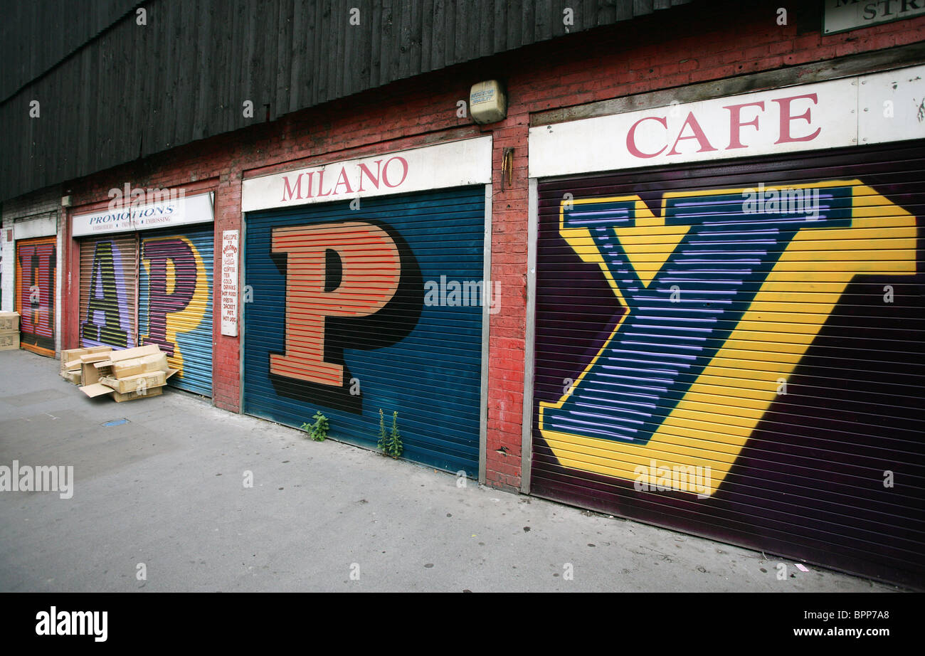 A street art piece by artist Ben Eine, depicting the word 'HAPPY' Ben ...