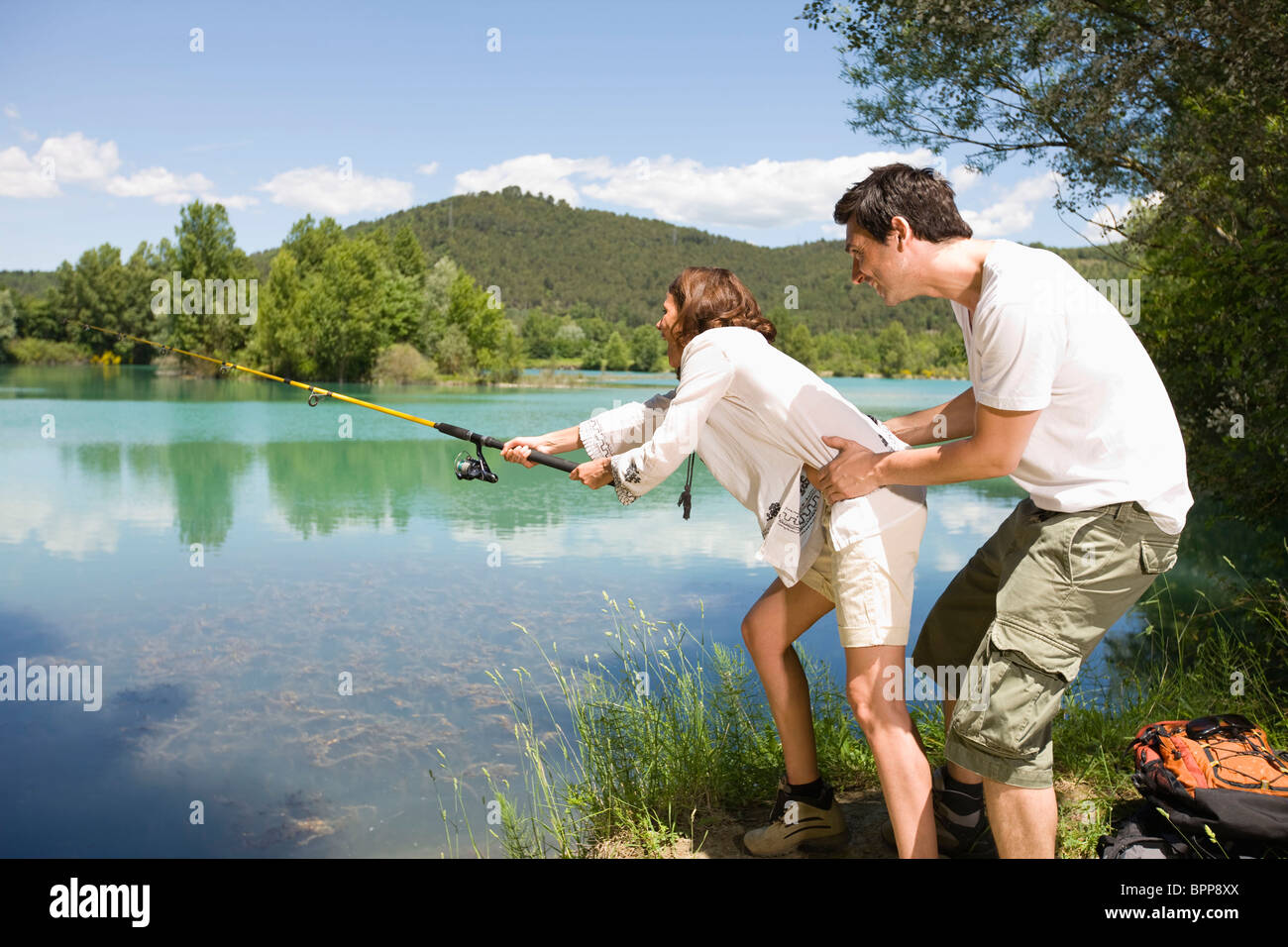 Man Catching A Fish High Resolution Stock Photography and Images - Alamy