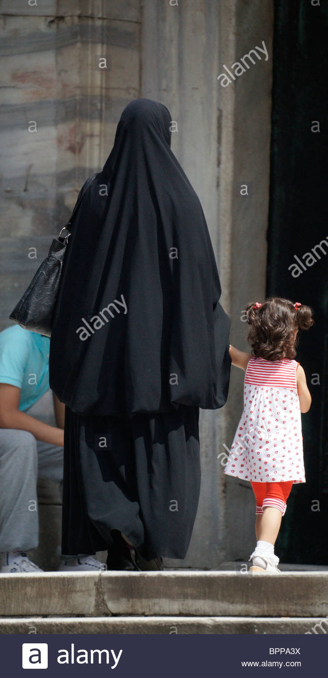 Woman In Niqab Walking In High Resolution Stock Photography and Images ...