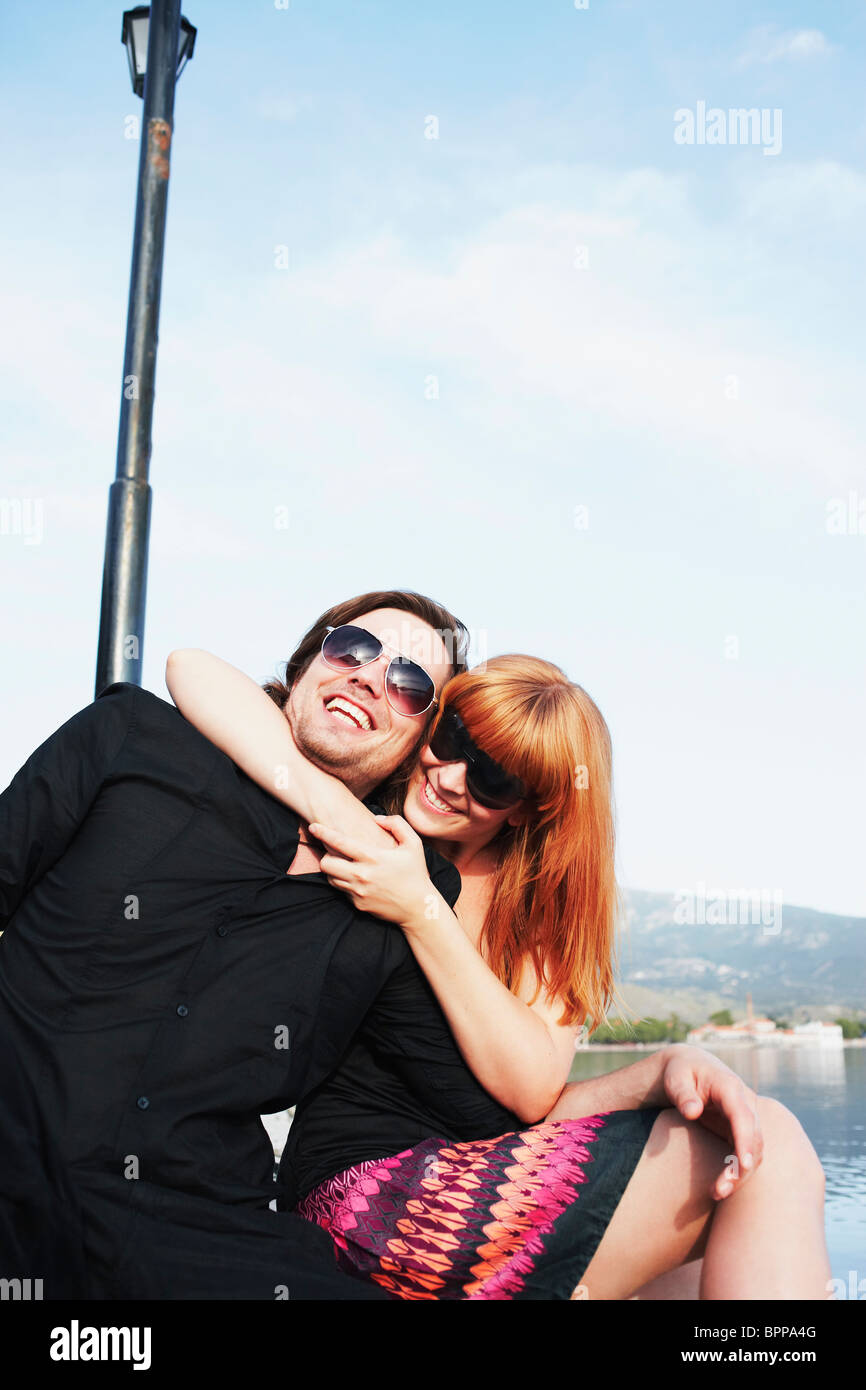 Woman holding man in headlock Stock Photo - Alamy