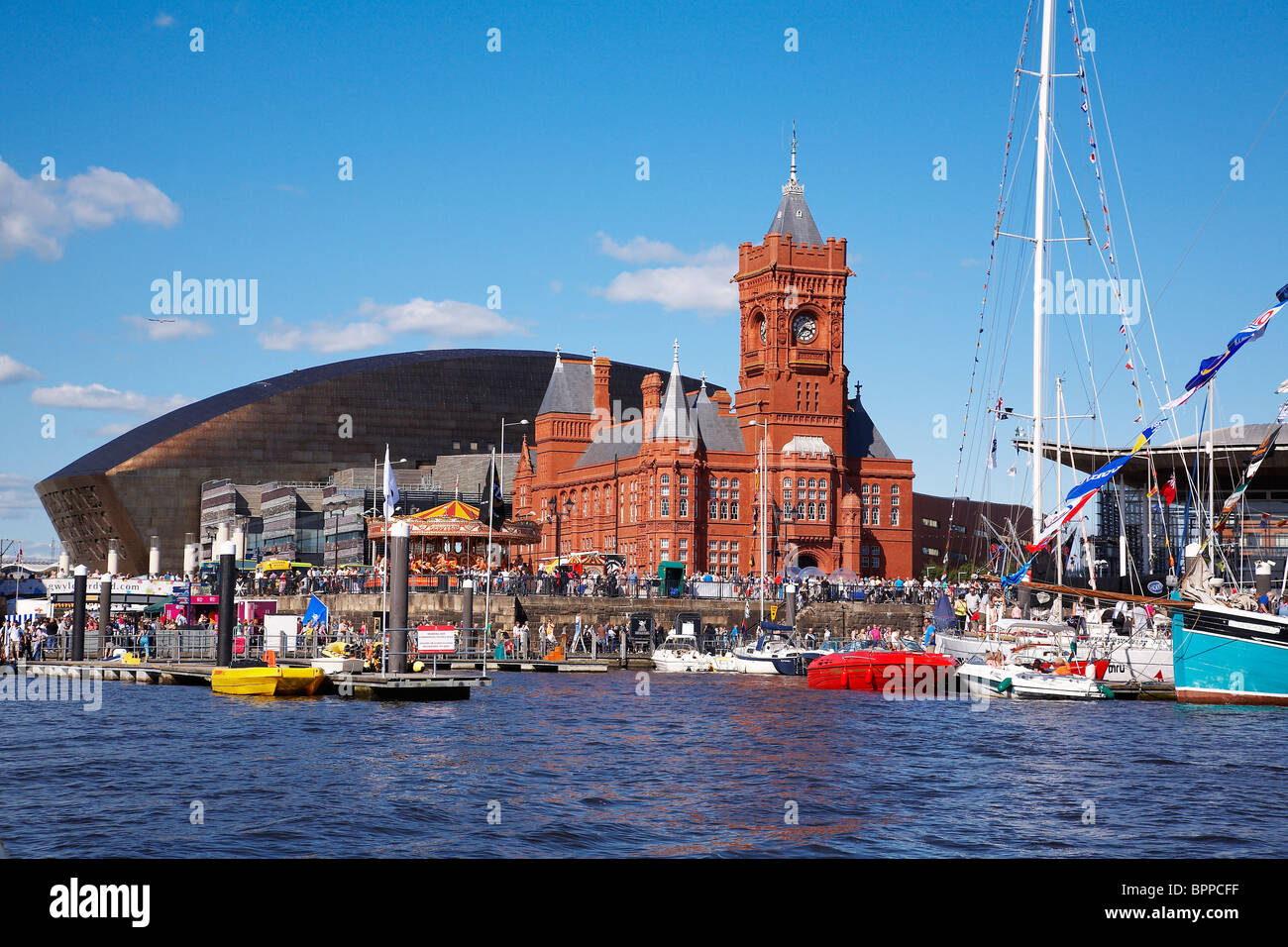 Mermaid quay with the Pierhead building and Millenium centre at Cardiff ...